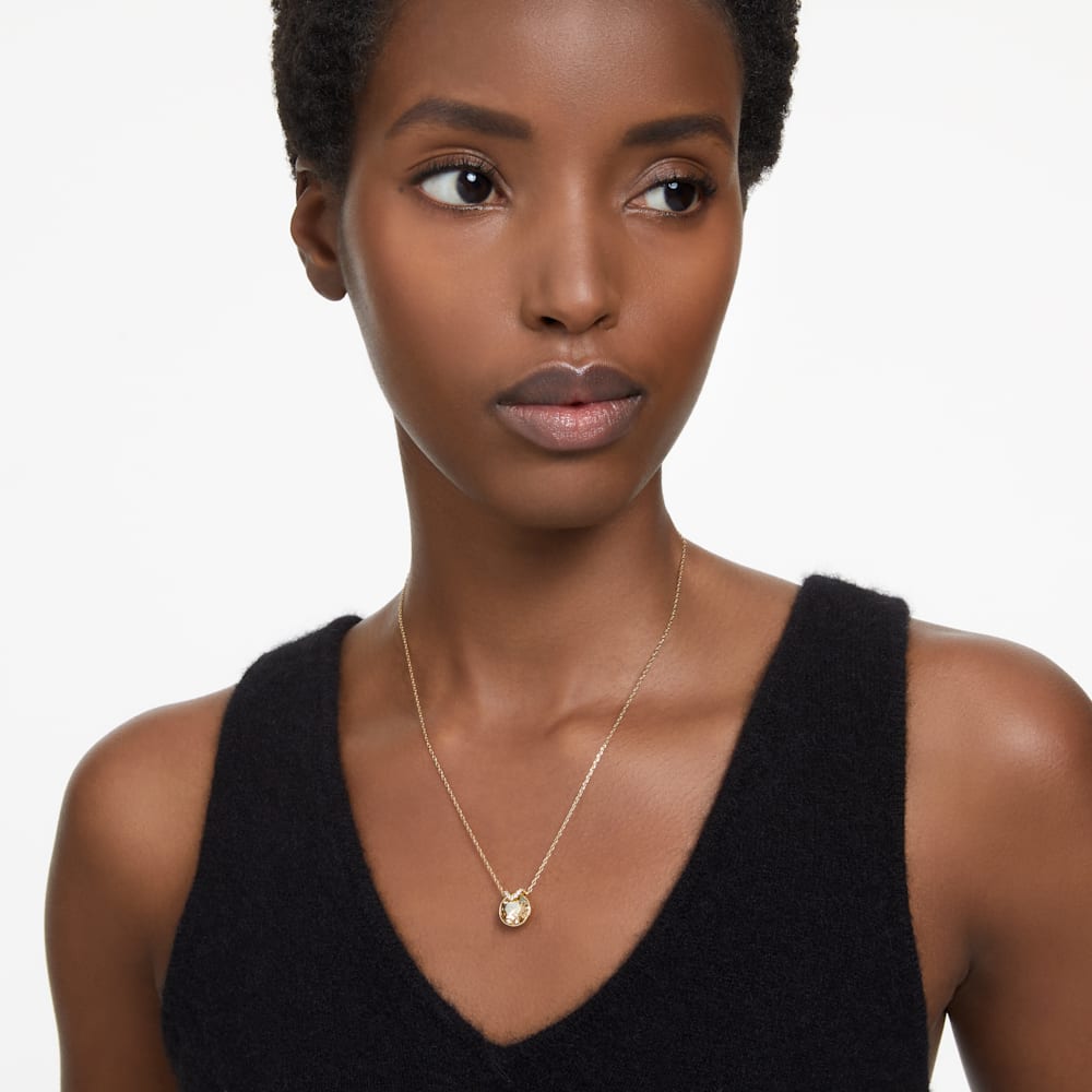 Bella V pendant, Round cut, Gold tone, Gold-tone plated | Swarovski